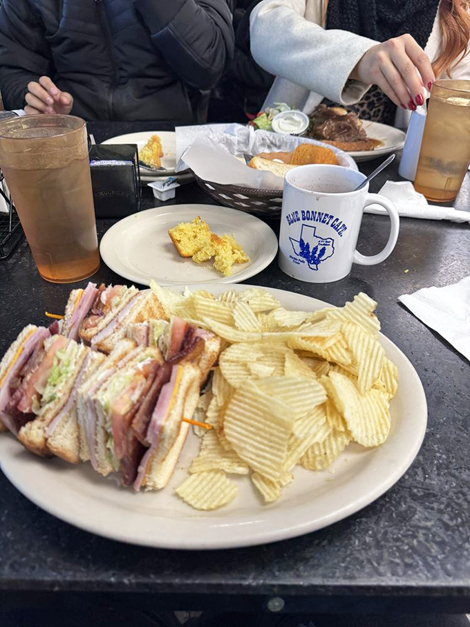 The club sandwich: architectural marvel, balanced meal, and proof that sometimes the classics endure because they're simply unimprovable.
