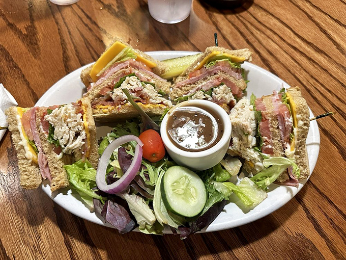 Club sandwich architecture at its finest! These triple-deckers showcase the art of layering meats, veggies, and spreads into handheld masterpieces.