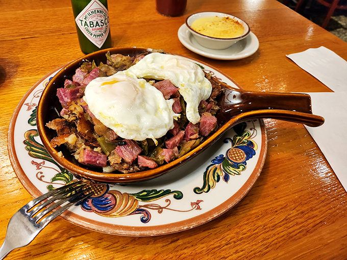 Corned beef hash crowned with perfectly poached eggs&mdash;the breakfast equivalent of finding front-row concert tickets in your coat pocket.