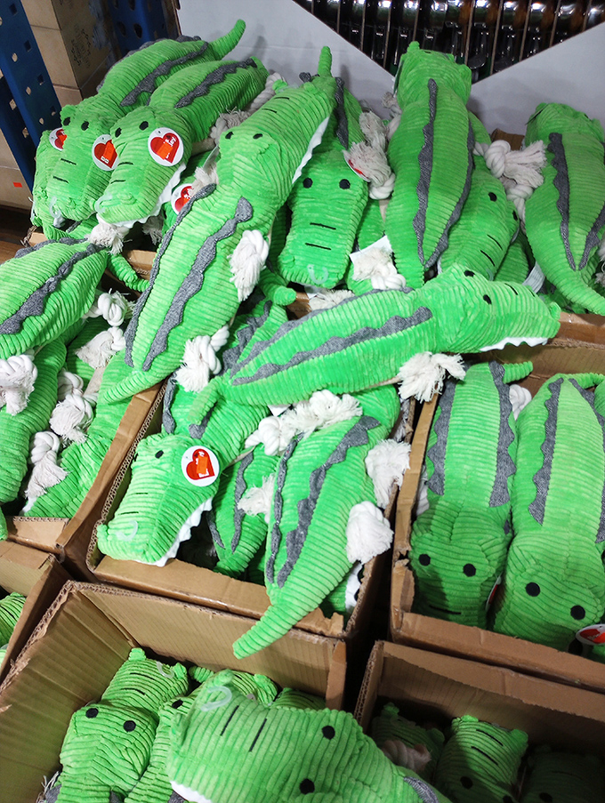 An army of corduroy crocodiles stands ready for adoption. These green guys aren't just toys—they're future best friends with surprisingly reasonable adoption fees.