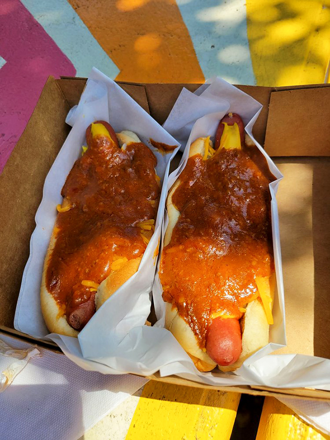These chili dogs aren't just topped &ndash; they're smothered with the kind of sauce that makes you contemplate moving closer to Winnetka.