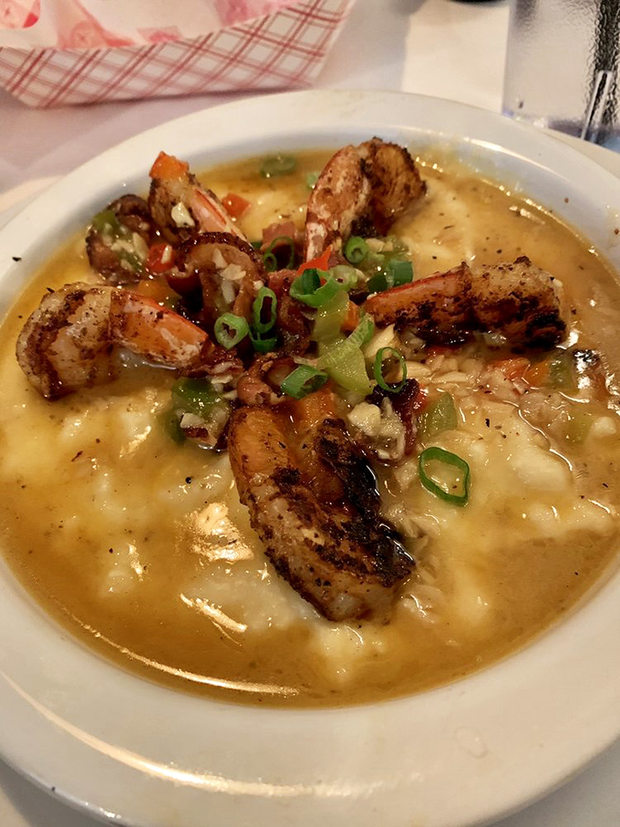The holy trinity of Southern cooking: perfectly seasoned shrimp, velvety grits, and a sauce so good you'll contemplate drinking it straight.