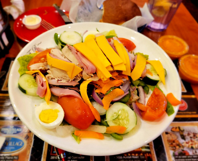 A chef's salad that actually makes eating vegetables feel like cheating on your diet. Fresh, colorful, and big enough to have its own zip code.