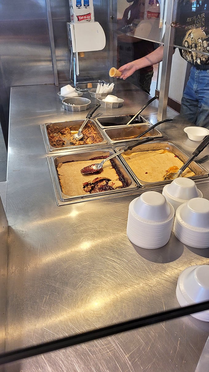 Cobbler paradise! Someone's grandmother is clearly working behind the scenes, blessing these desserts with that perfect balance of fruit and buttery crust.