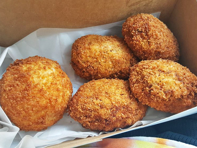 These golden orbs of deviled crab goodness aren't just fried&mdash;they're transformed. Four perfect specimens waiting to make your acquaintance.