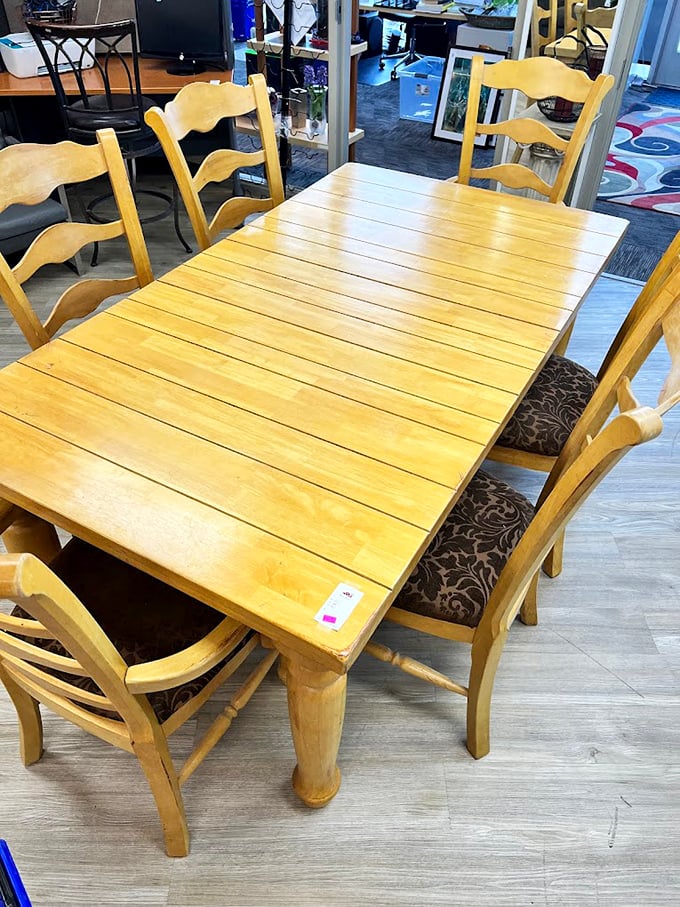 This solid wood dining set has probably hosted more meaningful conversations than most therapists. Quality craftsmanship that's outlasted trends and fads.