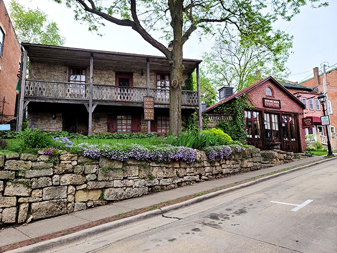 Stone walls and weathered wood tell stories older than your grandparents' first date at this historic Galena home and adjacent shop.