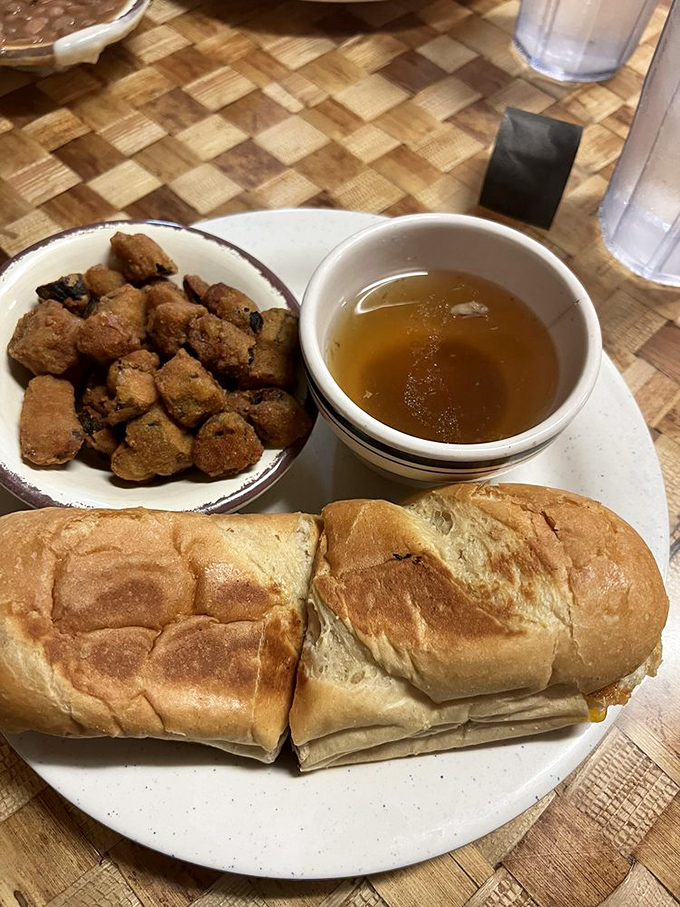 Comfort in a bowl: tender beef, savory broth, and freshly baked bread—the kind of sandwich that makes you wonder why you'd ever order anything else.