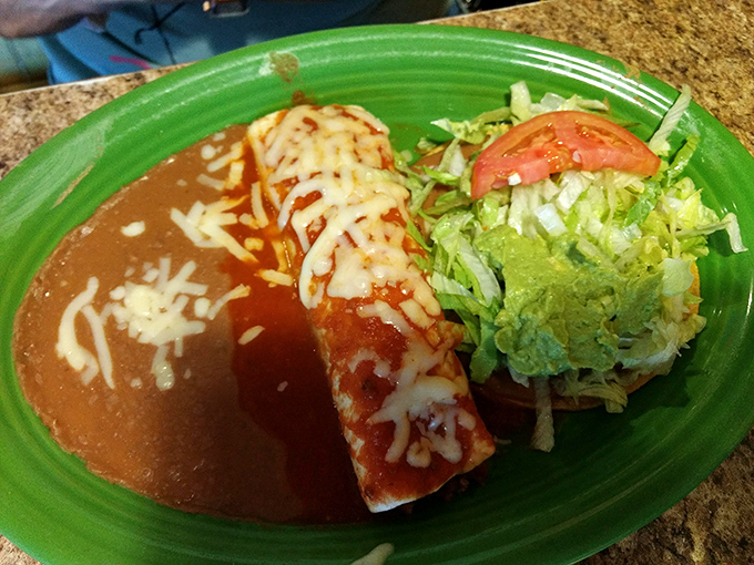 A proper enchilada should maintain structural integrity while surrendering to your fork – this one passes the test with flying colors.