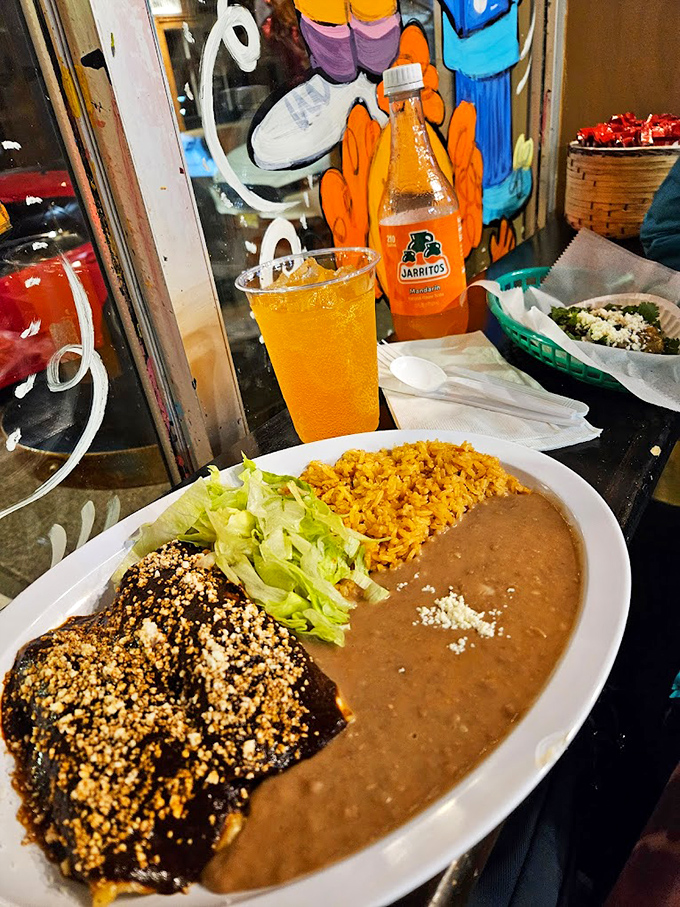 When your plate arrives looking like this, you know you've made all the right decisions in life. That orange rice isn't just a side &ndash; it's a supporting actor deserving its own award.