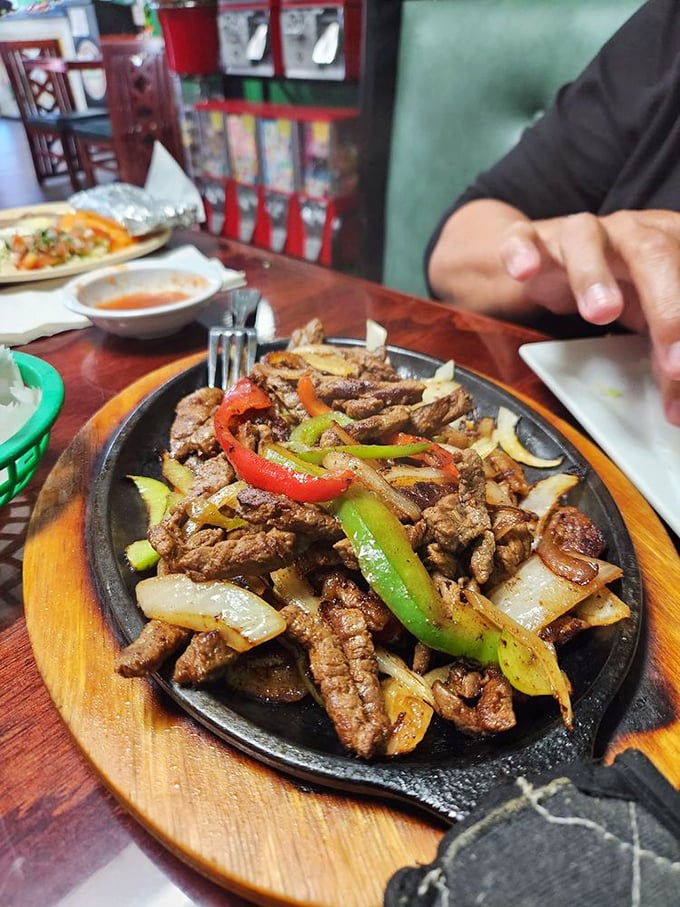 Sizzling fajitas that announce their arrival before you see them. The bell peppers and onions aren't just garnish&mdash;they're essential supporting actors.