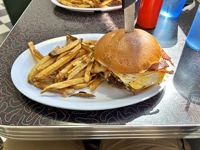 The Farm Burger doesn't just bridge breakfast and lunch&mdash;it unites them in holy matrimony with a runny egg and crispy bacon atop a perfect patty.
