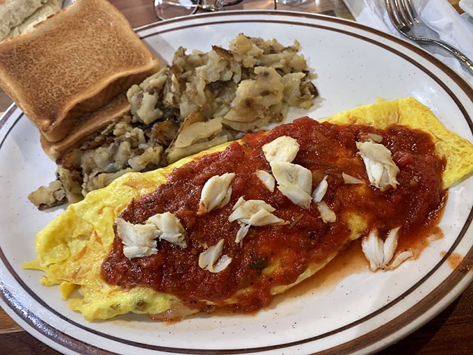 The Fat Tuesday Omelet brings Mardi Gras to Maryland with every bite. That vibrant sauce and lump crab meat? Laissez les bon temps breakfast!