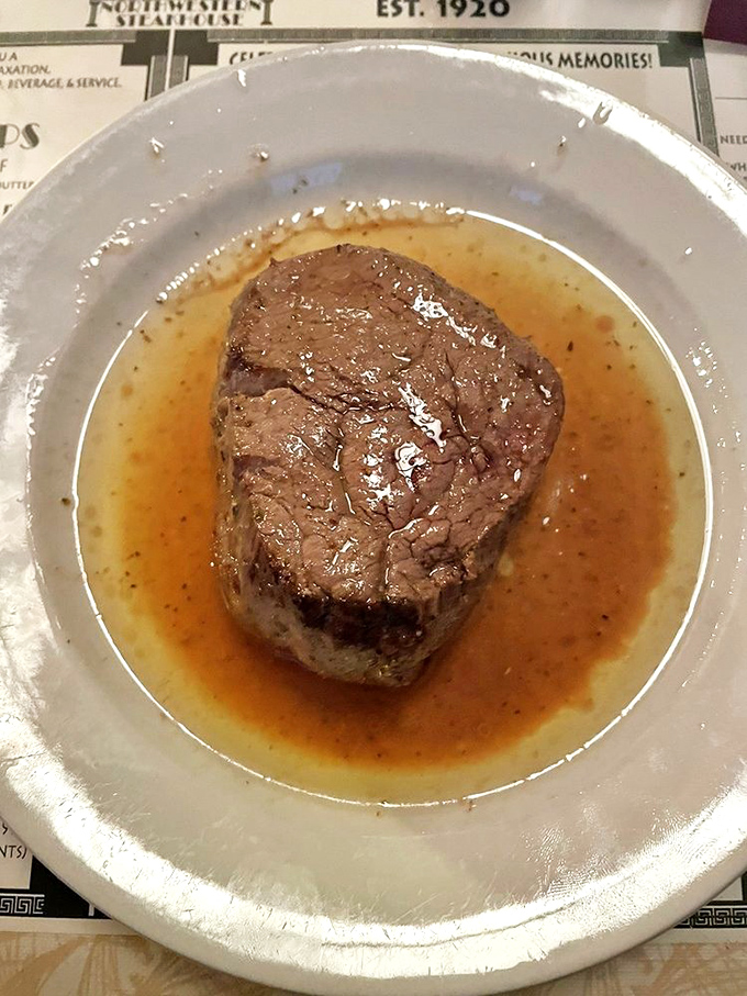 This filet mignon isn't just a steak; it's a butter-bathed revelation that makes first-timers go silent mid-conversation. Worth every mile of the drive.