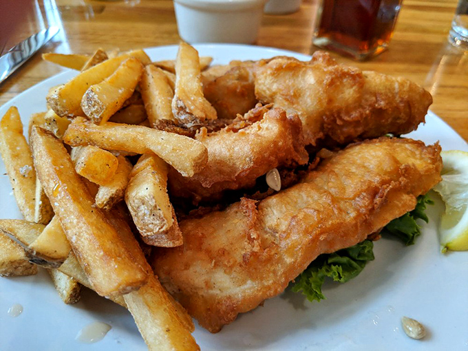 That perfect moment when the batter shatters like glass and reveals the steamy, flaky fish beneath. Poetry on a plate.