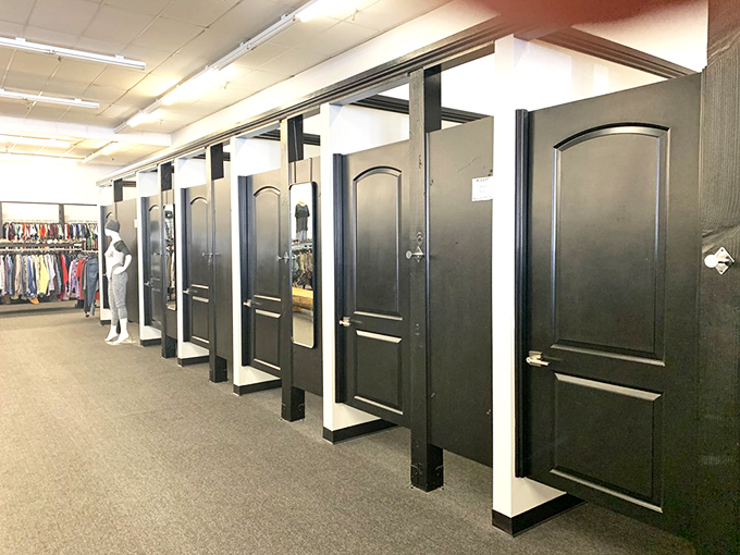 The fitting room area rivals department stores with its sleek design&mdash;because trying on vintage deserves a dignified space.