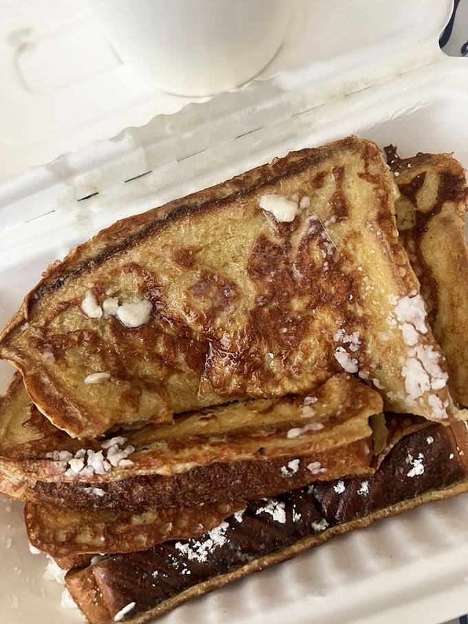 French toast so perfectly golden and dusted with powdered sugar, it belongs in the breakfast hall of fame.