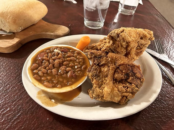Fried chicken so perfectly golden, it deserves its own trophy. Those beans aren't just a side&mdash;they're a supporting actor worthy of recognition.