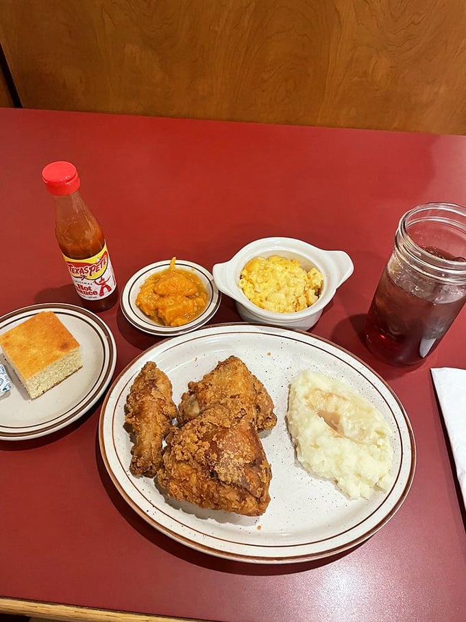 Southern harmony on a plate. That mac and cheese isn't a side dish—it's a co-headliner in this comfort food concert.