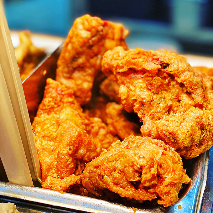 Fried chicken so perfectly golden it makes you wonder if they hired Midas as the head chef.