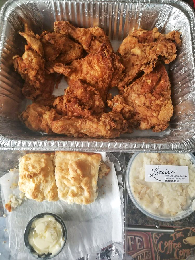 The kind of fried chicken that makes conversation stop mid-sentence. Add homemade biscuits and coleslaw, and you've got a holy trinity of comfort.