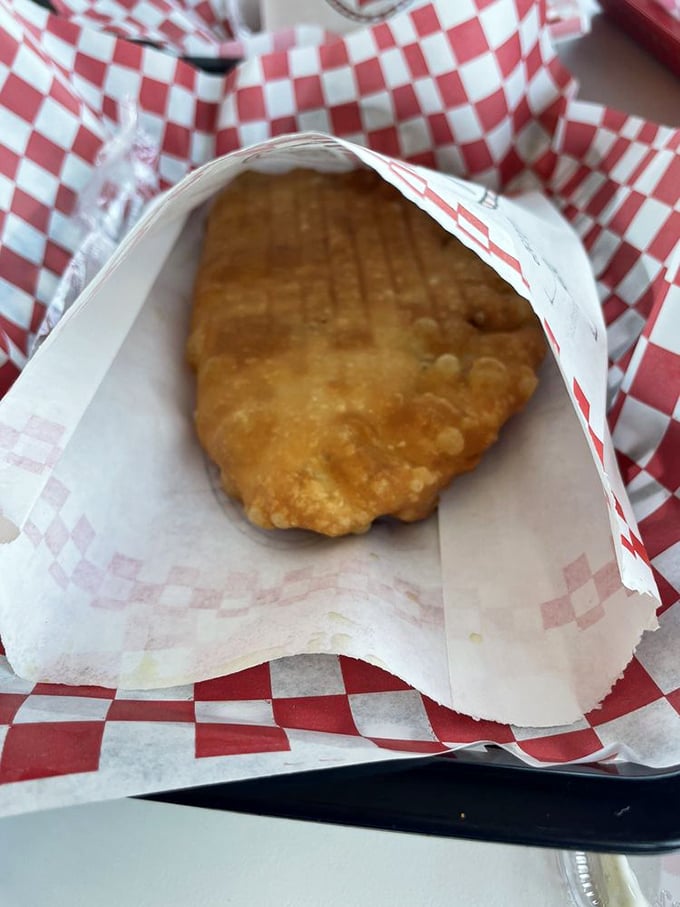 Wrapped like a present, this hand-held treasure proves that the best things in life don't need fancy packaging, just perfect execution.