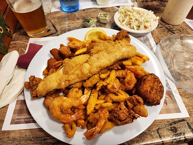 The fried seafood platter that answers the eternal question: "Why choose one when you can have it all?" Hushpuppies included for good measure.
