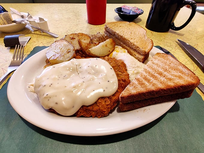 This isn't just chicken fried steak &ndash; it's edible therapy with a side of buttery toast for sopping up every last drop of that heavenly gravy.
