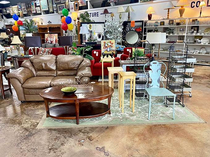 Mid-century coffee tables meet plush leather sofas in this furniture vignette that screams, "Your apartment could look this interesting too!"