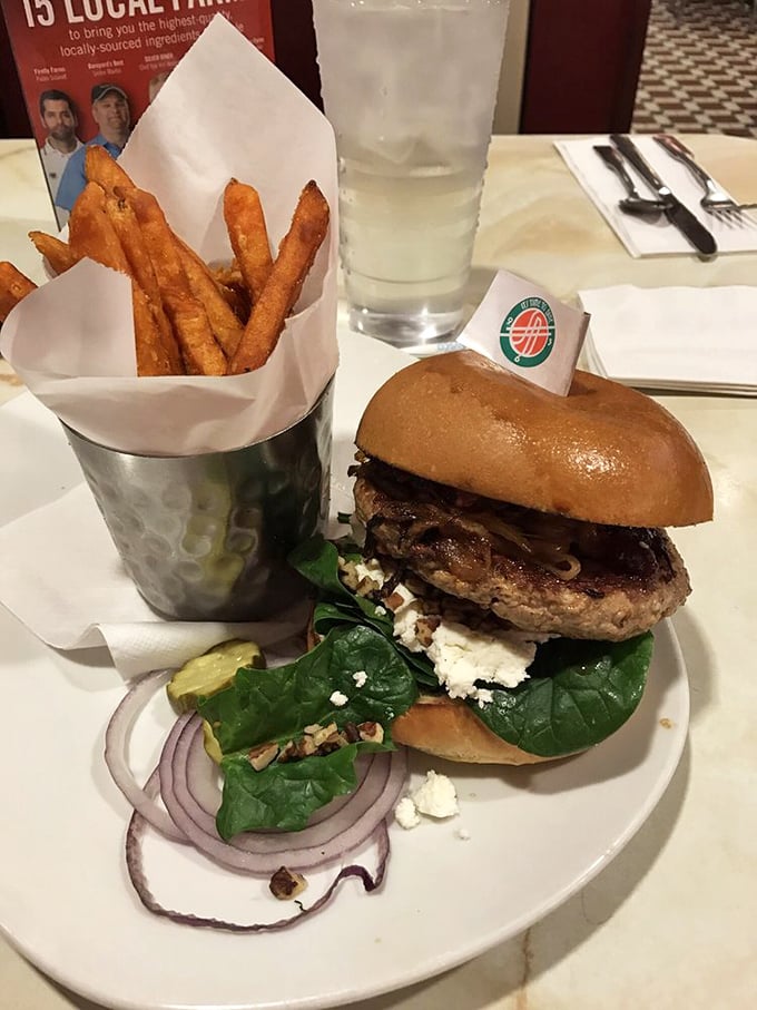 The turkey burger that converted skeptics. With goat cheese, spinach, and those perfectly crisp sweet potato fries, it's health food that forgot to be boring.