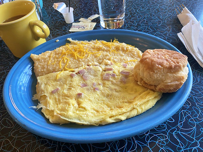 This isn't just breakfast&mdash;it's edible architecture. A golden-yellow omelet with ham and cheese that makes hitting the snooze button seem like a criminal offense.
