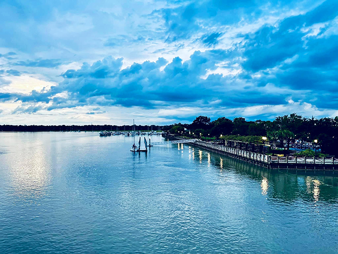 The waterfront at dusk &ndash; when the clouds perform their nightly color show and the water responds with a standing ovation of reflections.