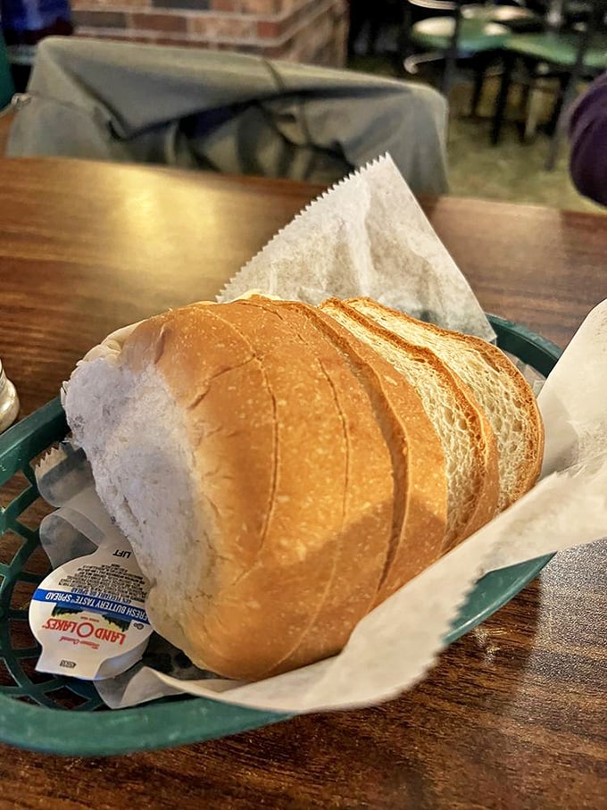 Pillowy white bread that knows its supporting role. The perfect tool for sopping up every last morsel of that magical chicken gravy.