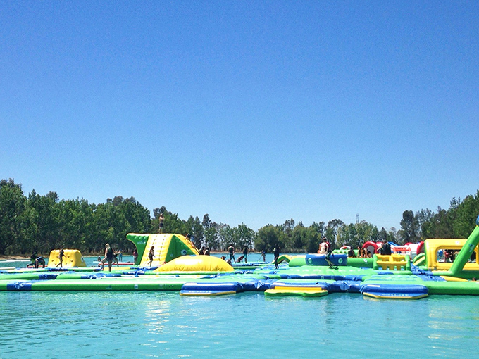 A floating obstacle course that makes "America's Funniest Home Videos" producers weep with joy&mdash;challenging enough for teenagers, humbling enough for their parents.