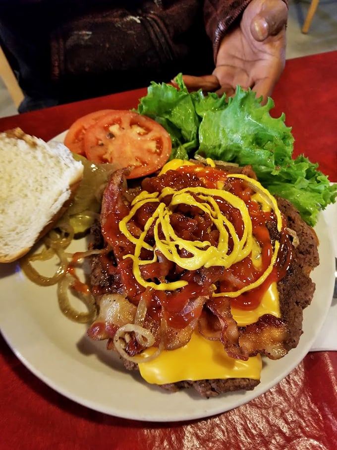 Layers of melted cheese, bacon, and grilled onions transform this burger from mere meal to masterpiece. Architecture you can eat!