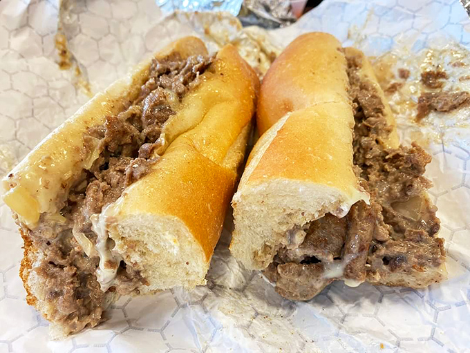A proper cheesesteak should require napkins and commitment. This beauty delivers both with tender meat and melted cheese in perfect harmony.