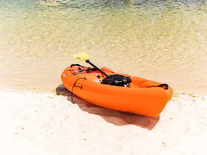 That orange kayak isn't just transportation&mdash;it's your ticket to explore Lake Chatuge's hidden coves after you've conquered the floating obstacle course.