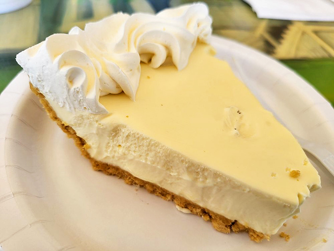 Key lime pie so authentic it should carry Florida state identification. That creamy yellow filling delivers sunshine in every silky, citrusy bite.
