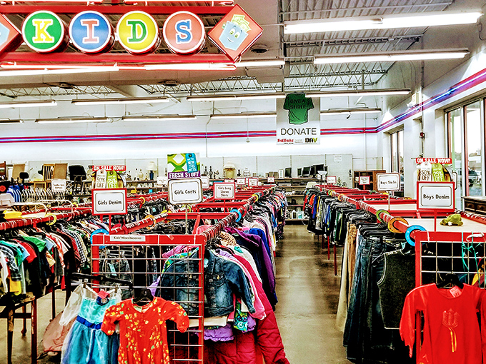 The kids' section beckons with neatly organized racks, where outgrowing clothes isn't a budget crisis but an adventure in affordable style.