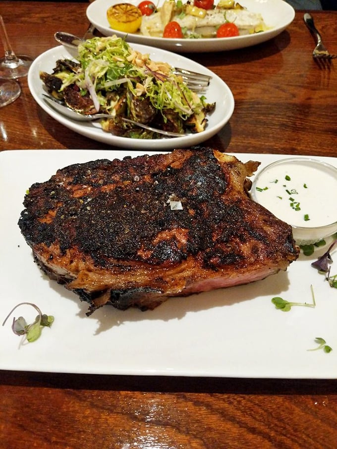 The King Cut Blackened Prime Rib arrives like royalty, surrounded by loyal subjects of fresh greens. The perfect meal doesn't exi&mdash;oh wait, here it is.