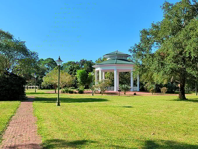 Lafayette Park's gazebo beckons beneath ancient oaks, offering a shady respite where the only notification you'll receive is from nature itself.