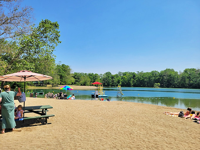 Lake Hudson's beach scene proves you don't need an ocean for a perfect summer day—just add water, sand, and the laughter of families escaping the heat.