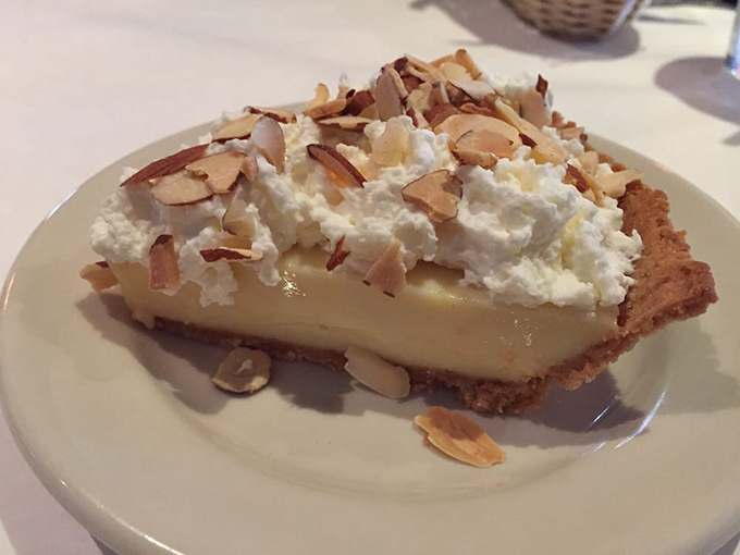This coconut cream pie with toasted almonds isn't just a dessert&mdash;it's what clouds must taste like if they were made by a Southern grandmother with something to prove.