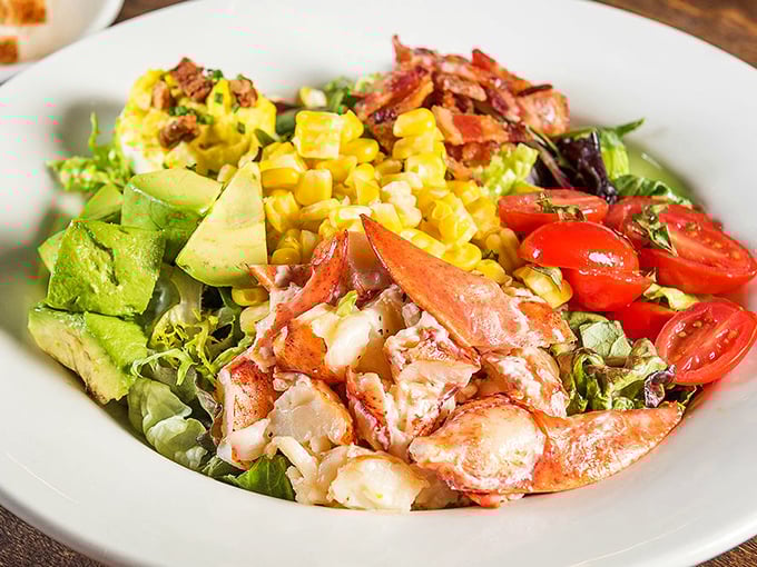 A colorful lobster salad that makes eating greens feel like a celebration rather than a obligation. Even the avocado looks happy to be here.