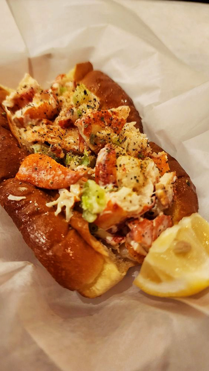 A close-up that makes you wish phones had smell-o-vision. Those chunks of lobster are staging a delicious rebellion against mediocre sandwiches everywhere.