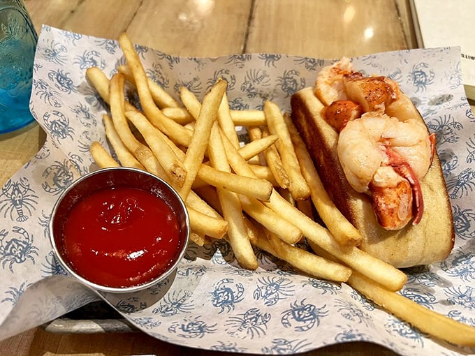 The lobster roll&mdash;seafood's answer to the question "What would paradise taste like between bread?" Served with perfect golden fries.