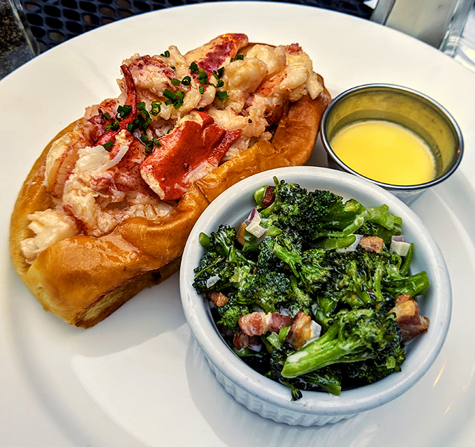 A marriage made in culinary heaven: buttery lobster roll meets garden-fresh broccoli salad. Your diet plan just called &ndash; it's taking the day off.