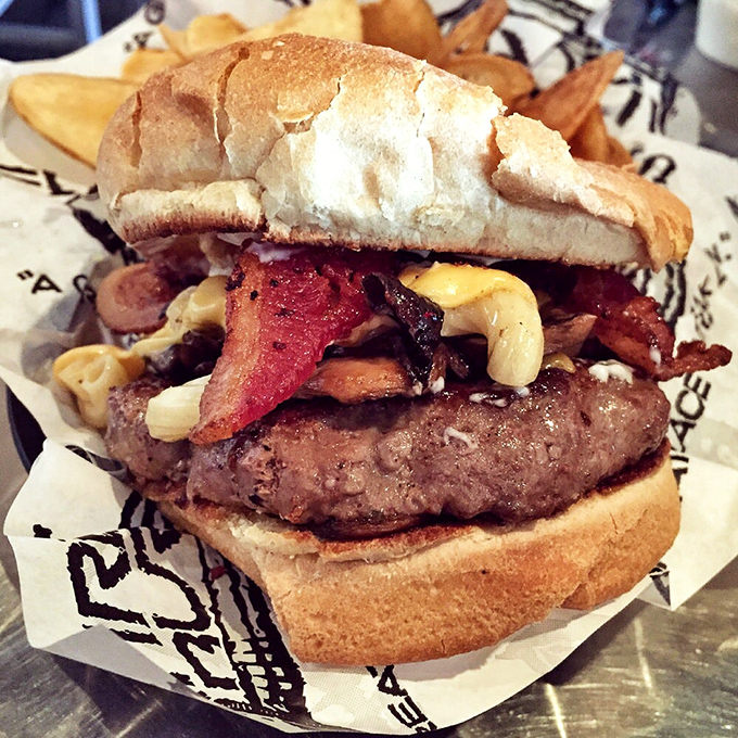 Meet the burger that haunts dreams: thick patty, bacon, mac and cheese. It's what would happen if comfort food went to graduate school.