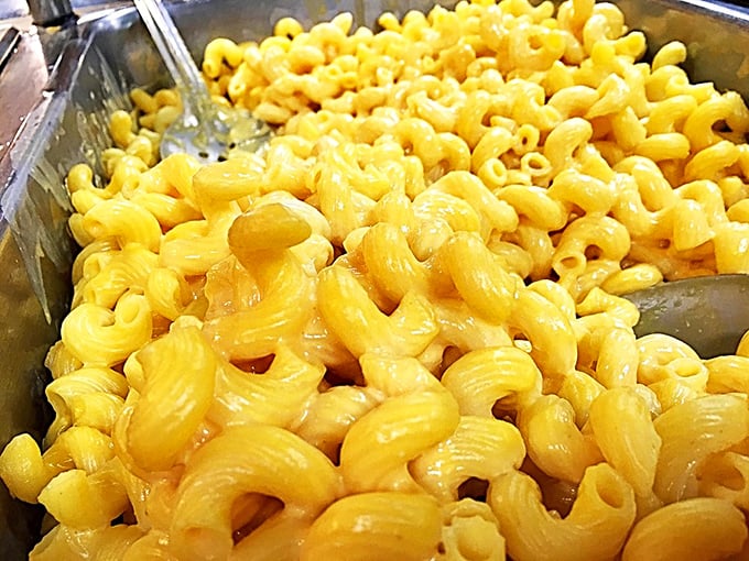 Mac and cheese that gleams like edible sunshine. This isn't the powdered stuff from your college days &ndash; this is the real, cheese-pulls-for-days deal.