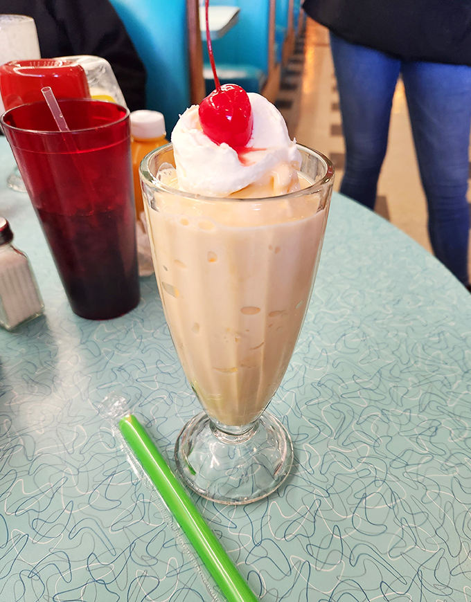 The classic milkshake: cold enough to give you brain freeze, rich enough to make you not care, and topped with a cherry that's purely ceremonial.